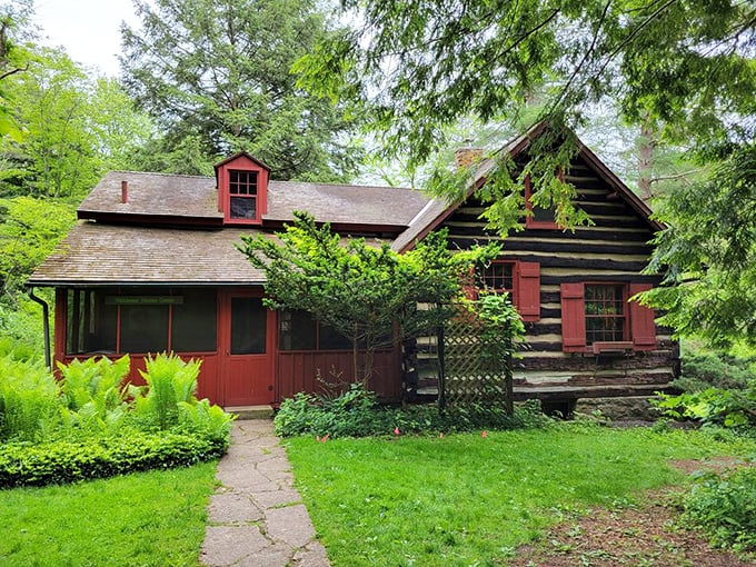This rustic cabin sits among the trees like a scene from your favorite childhood storybook.
