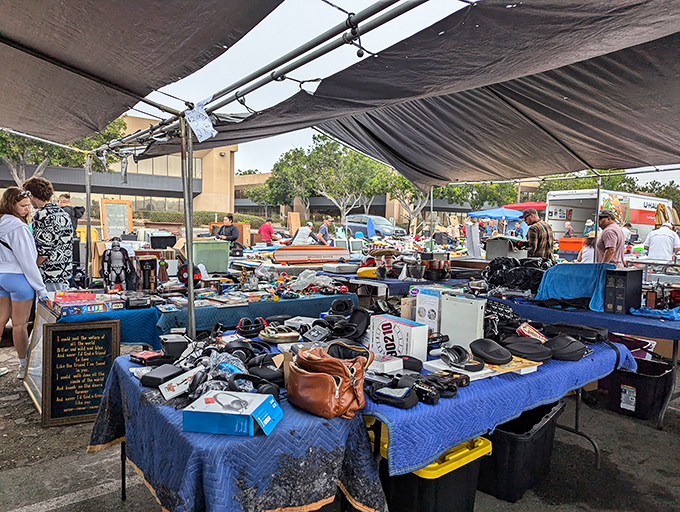 Organized chaos at its finest. Tables piled with potential treasures await the patient shopper willing to dig for that perfect something they didn't know they needed.