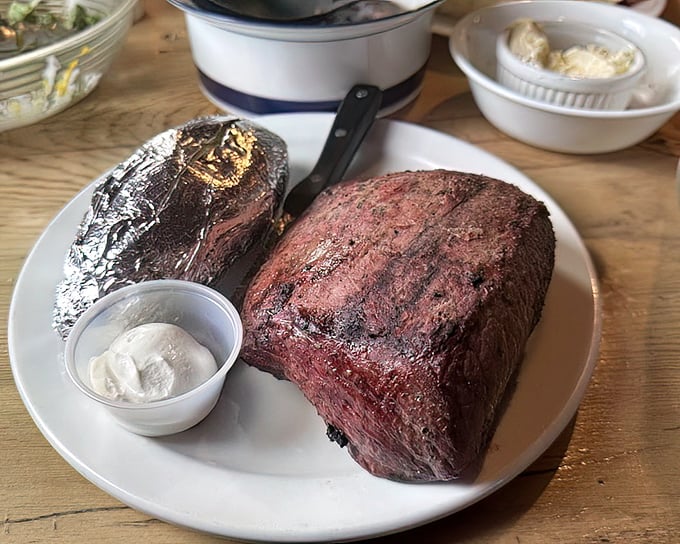 Not so much a steak as a monument to beef—charred exterior, rosy interior, and a size that makes you question your life choices.