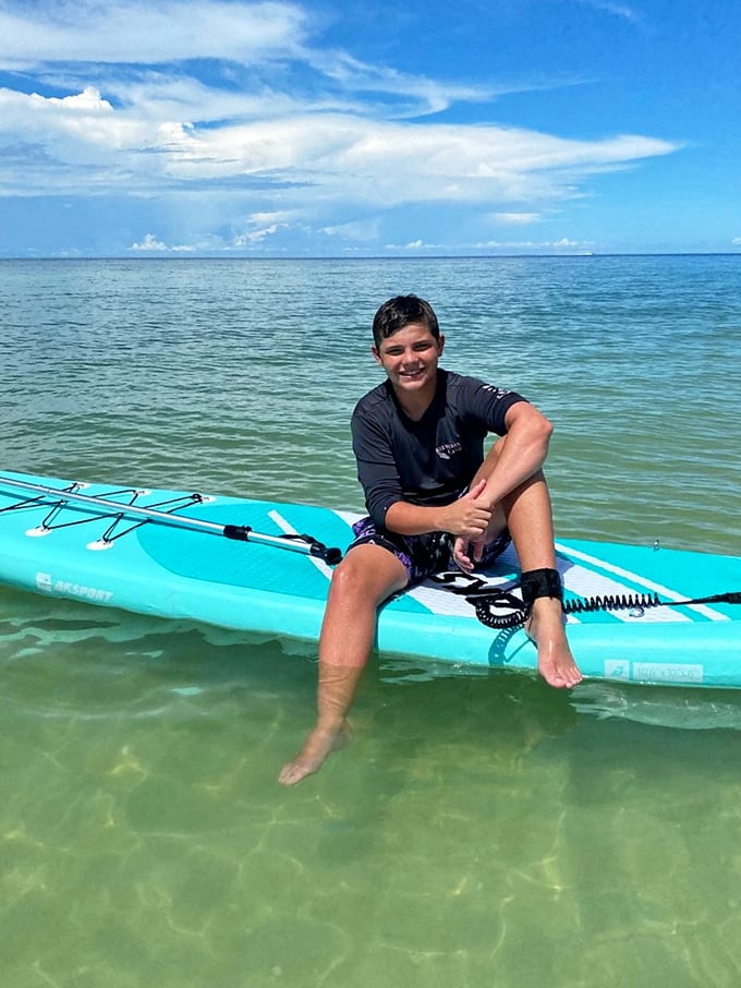 Adventure comes in turquoise packages on Keewaydin's crystal waters. This kayaker found the perfect balance between exercise and relaxation—emphasis on the latter.