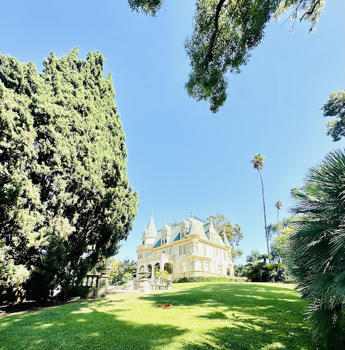 A sweeping view that makes you question your GPS—are we in Southern California or the French countryside? The towering cypress adds the perfect exclamation point.