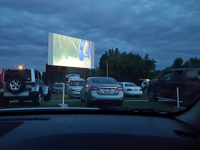 The best seat in the house? Your own car. As twilight fades, the screen flickers to life while viewers settle in for showtime.