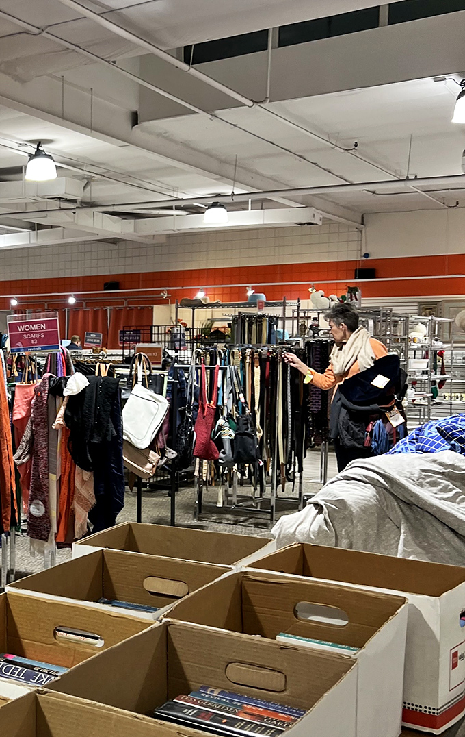 The clothing section is organized with military precision but browsed with artistic abandon. Every rack holds potential fashion redemption.