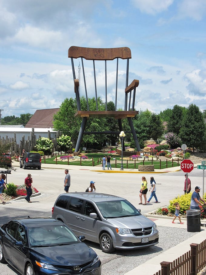Visitors flock to the chair like moths to a flame—if the flame were shaped like furniture from a giant's garage sale.