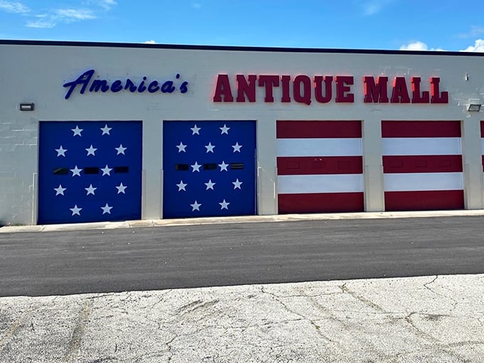 America's Antique Mall wears its patriotism on its garage doors – subtlety isn't necessary when your inventory spans two centuries of American life.
