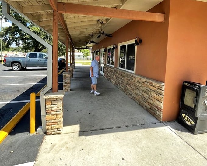 Big John's Alabama BBQ keeps it simple with a no-frills exterior. The line of customers tells you everything you need to know.