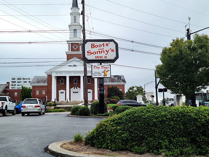 Boots & Sonny's: That iconic sign standing tall next to a church steeple—because hot dogs can be a religious experience too.