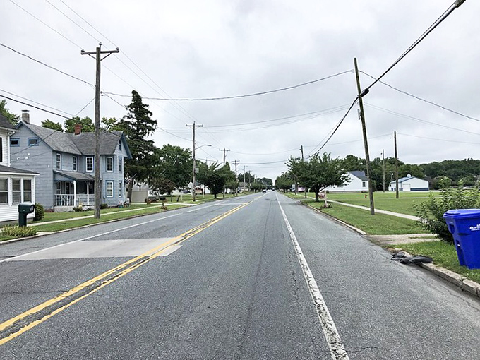 Ellendale's quiet residential streets stretch toward endless horizons where country living still means something special in Delaware. 
