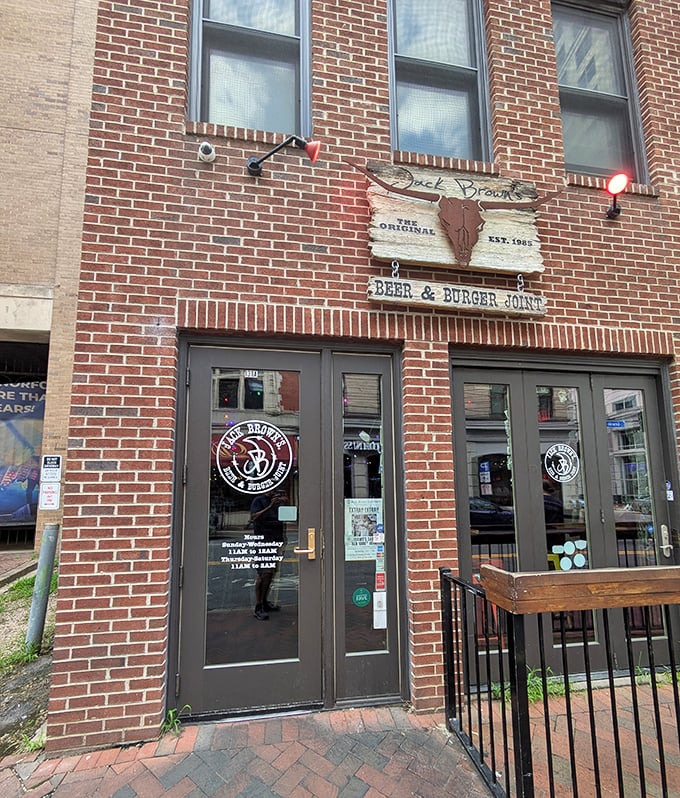 Jack Brown's wooden sign tells you exactly what matters: beer and burgers. No false advertising here—just honest-to-goodness deliciousness.