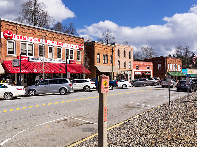 Colorful storefronts welcome visitors to a town where "rush hour" means three cars at the stop sign.