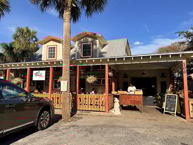 The Lost Dog Cafe's porch, complete with bone-shaped railings, welcomes both two-legged and four-legged breakfast enthusiasts.