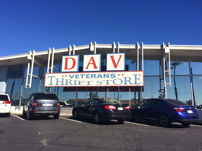The DAV Veterans Thrift Store's distinctive red, white, and blue sign stands proud. Shopping here supports those who've supported our country.