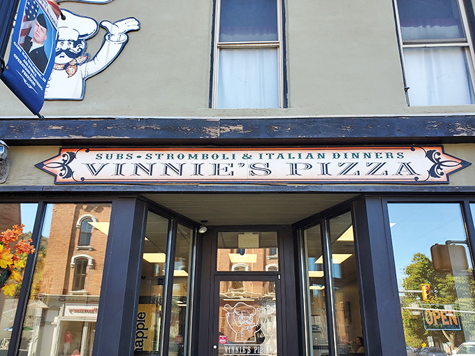 Small-town charm meets big pizza flavor – Vinnie's unassuming exterior hides Troy's best-kept secret.