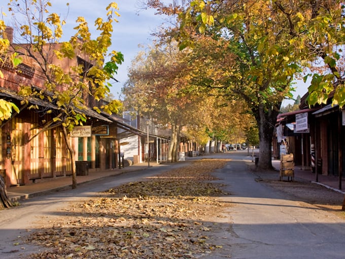 Tree-lined streets create natural shade for leisurely strolls through this perfectly preserved Gold Rush gem.