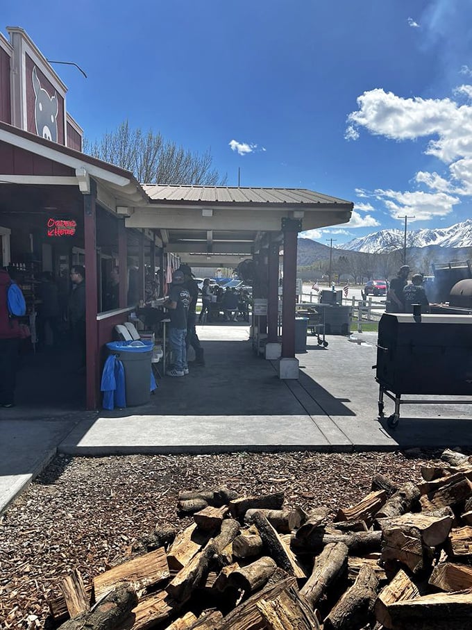 Those stacks of wood aren't just for show – they're the secret ingredient in Copper Top's legendary oak-smoked specialties.