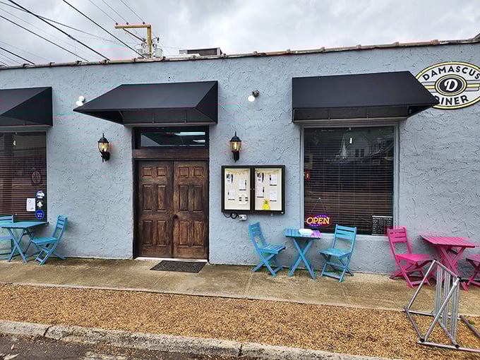 Colorful chairs outside Damascus Diner invite you to sit and savor—breakfast theater with the best seats in town.