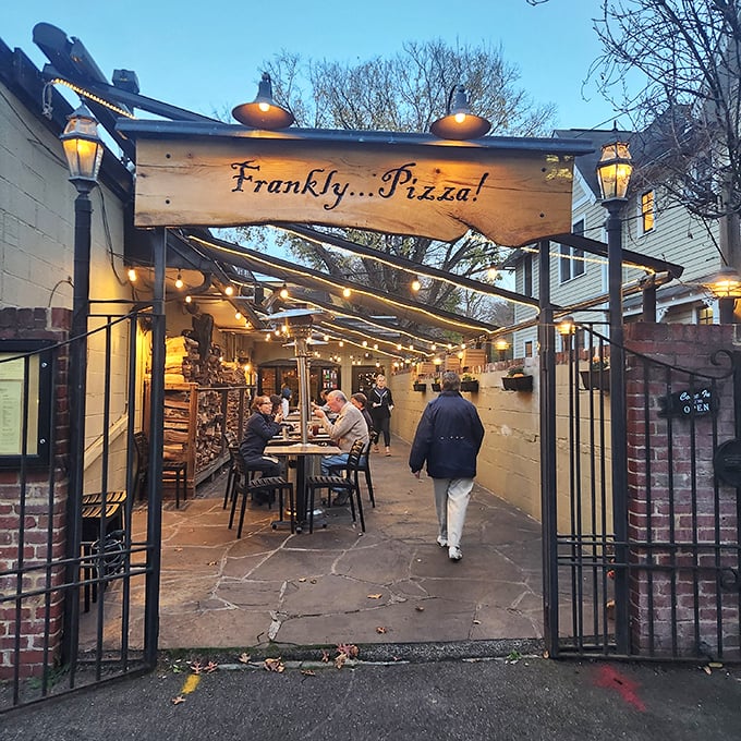 The magical outdoor dining area at Frankly…Pizza! where every table feels like you've discovered a secret garden of pizza delights. 