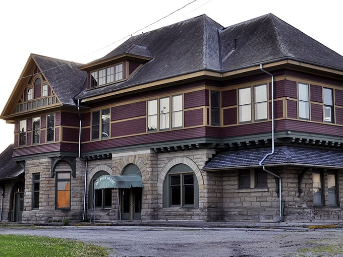 The old depot stands proud like a retired athlete - still got the moves, just different game now. 