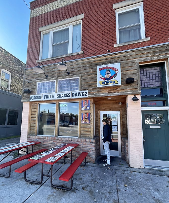 That red picnic table outside Hamburger Mikey isn't just seating—it's an invitation to join Muskegon's most delicious community gathering.
