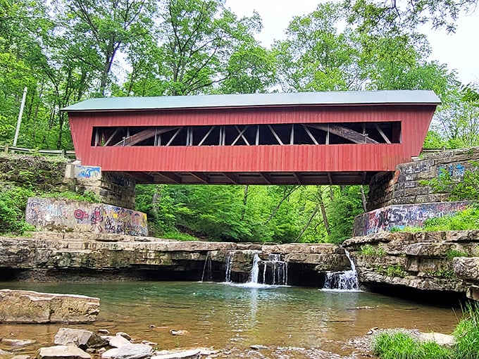 Water dancing over rocks below while you stand in this wooden sanctuary – pure Ohio poetry.