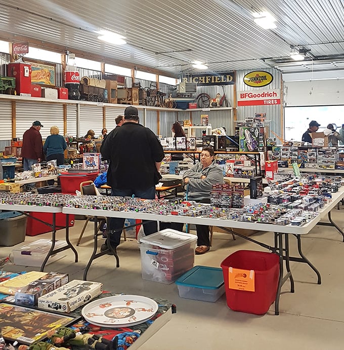 Patriotic displays and nautical treasures at Jake's outdoor market. Every table tells a different collector's story.