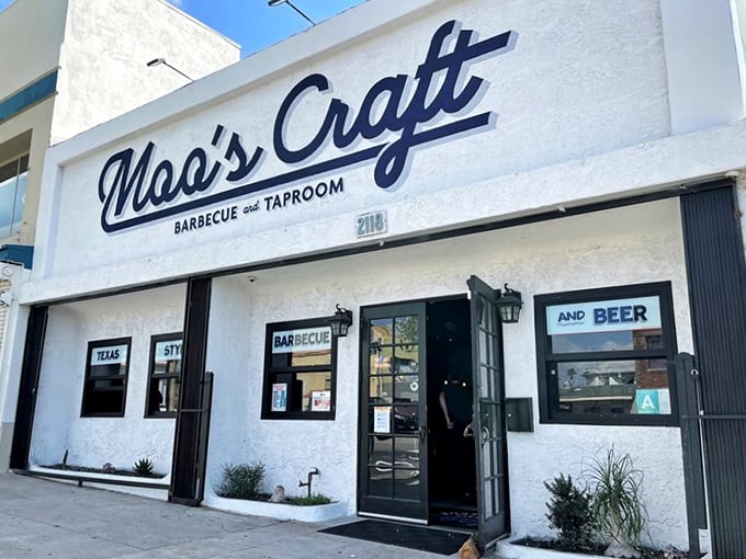 Moo's Craft Barbecue proves great BBQ doesn't need frills—just fundamentals and a line of patient devotees. The white building says "nothing to hide," and the meat inside confirms it.