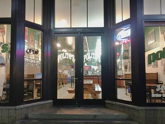 After dark, Polito's glows like a lighthouse for the pizza-starved – guiding hungry souls toward oversized slices of comfort.