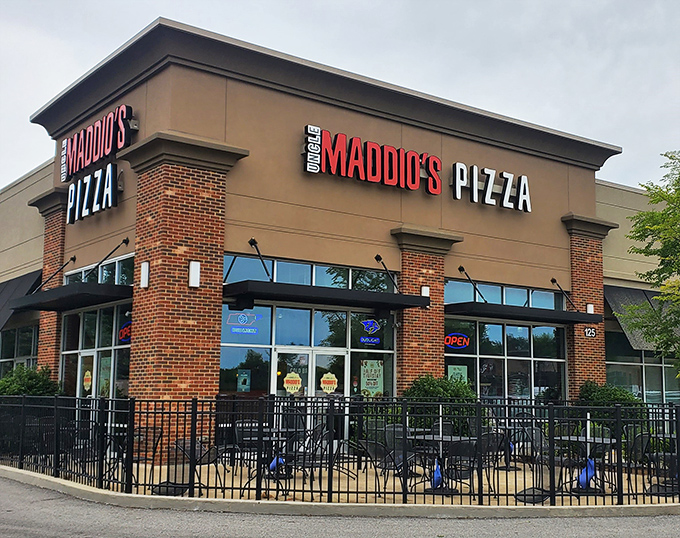 Those red umbrellas aren't just for show – they're signaling that something deliciously special is happening at Uncle Maddio's.