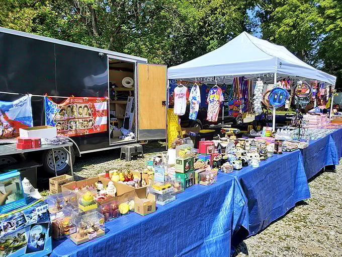 Bargain hunters browse outdoor displays at Willow Glen Flea Market, where "shopping" and "scavenger hunt" become delightfully synonymous.