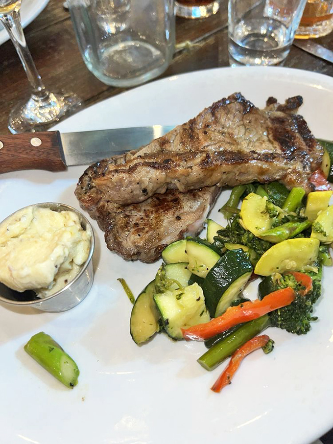 This steak doesn't need a sales pitch—just a sharp knife. The perfect char tells you everything about the kitchen's mastery of fire.