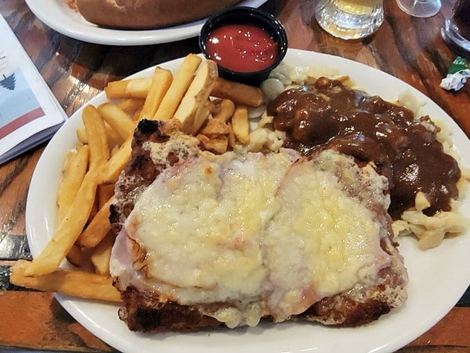 Alpine schnitzel that's been pounded thin, breaded to perfection, and topped with melty cheese—comfort food that transcends language barriers.