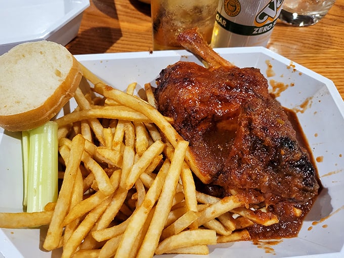 The BBQ chicken that launched a thousand road trips – crispy, saucy perfection on a plate.