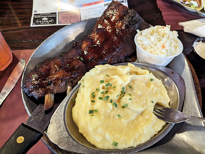 Fall-off-the-bone ribs that don't just whisper "eat me"—they perform a full Broadway musical number. Those mashed potatoes deserve their own standing ovation.