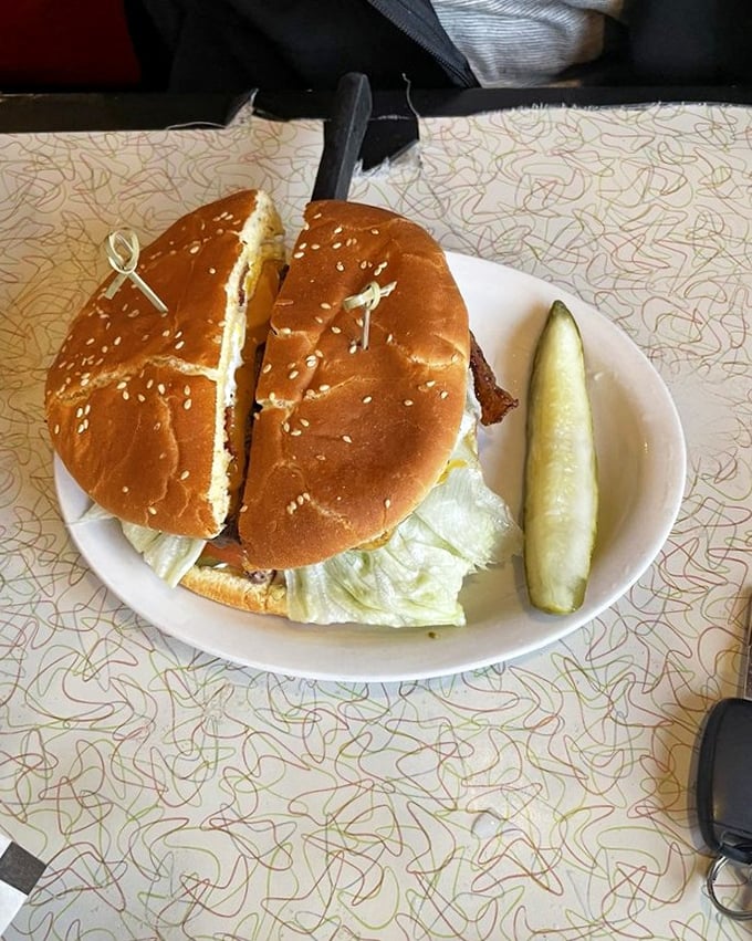 The bacon cheeseburger and pickle—a duo more iconic than Batman and Robin, but significantly more satisfying after a long day.