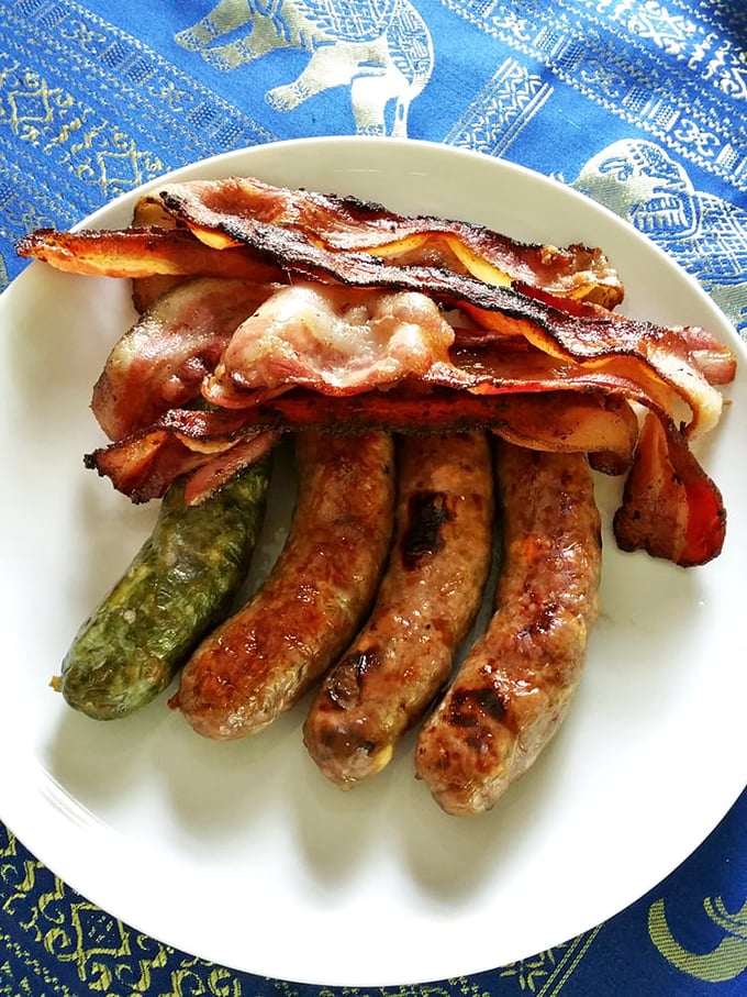 Breakfast of champions? More like breakfast of food gods—crispy bacon and plump sausages that make hitting the snooze button a criminal offense.