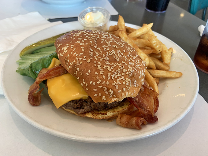 The bacon cheeseburger that answers the eternal question: "Can happiness be served on a sesame seed bun?" Spoiler alert: absolutely yes.
