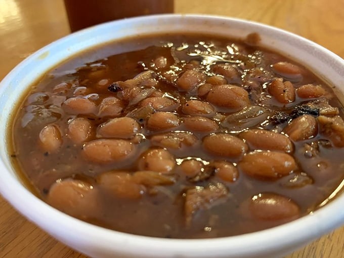 These aren't just beans—they're tiny flavor sponges that have soaked up all the smoky goodness from their meaty neighbors.