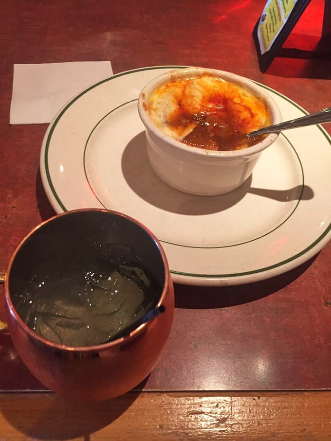 The crème brûlée's caramelized top waits to be cracked like a frozen lake in spring—revealing silky custard treasures below.
