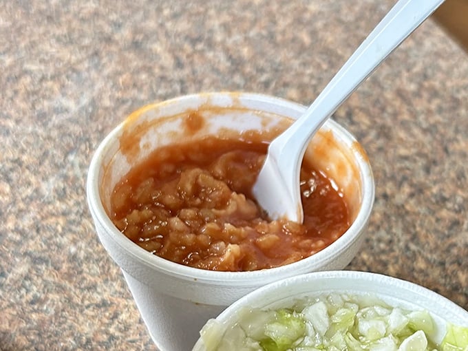 The hot sauce isn't about heat—it's about flavor. This tomato-based Serbian sauce is the Robin to Barberton chicken's Batman.