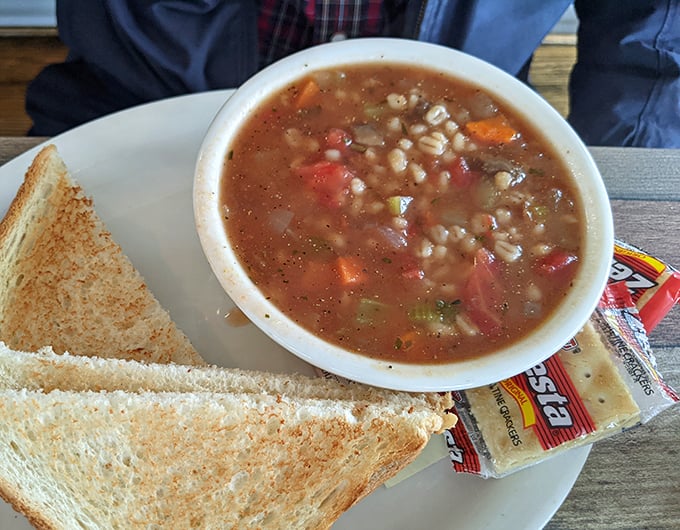 A bowl of homemade barley soup that would make your grandmother nod in approval. Paired with toast and crackers – because double-carbing is always the right decision.