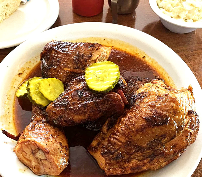 A BBQ trinity that would make a Texan weep with joy—chicken, ribs, and something pickled for contrast. Balance in all things.