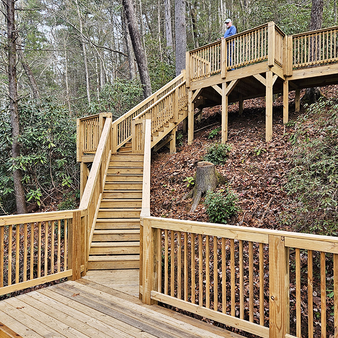 These wooden steps aren't just a trail feature—they're an invitation to adventure, leading visitors deeper into Saluda's natural treasures.