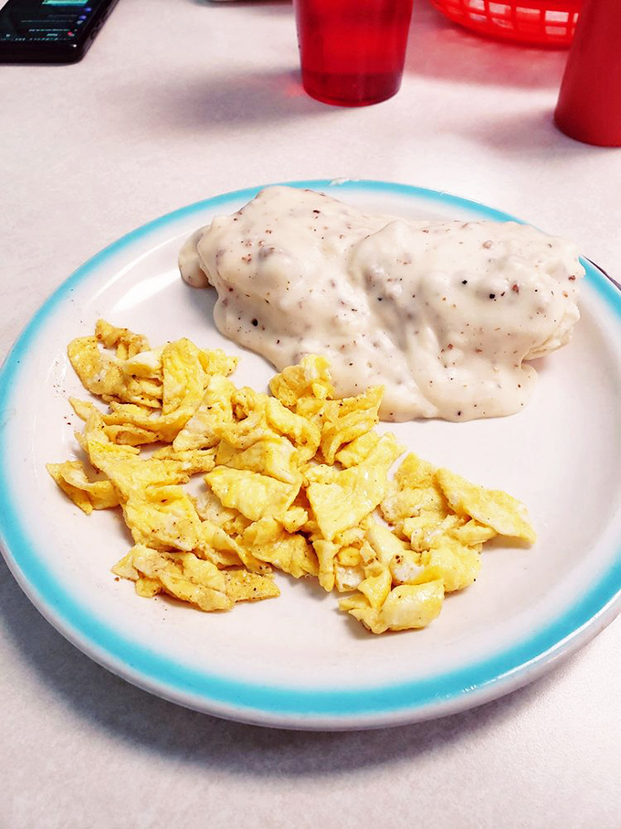 Biscuits and gravy so authentic, your Southern grandmother would nod in approval. That gravy blanket isn't just comfort food—it's a full comfort comforter.