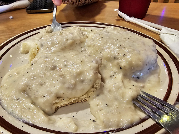 Biscuits and gravy that would make your Southern grandmother weep with joy. That pepper-speckled blanket of comfort isn't messing around.