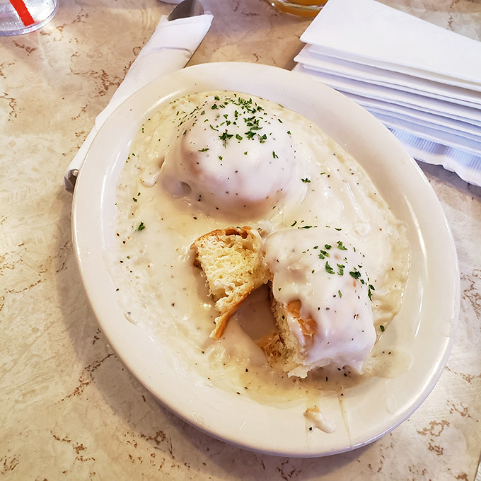Biscuits and gravy—the breakfast that hugs you from the inside. This plate doesn't just feed your body; it soothes your soul.