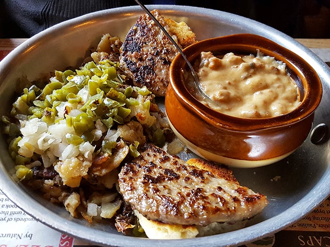 When potatoes meet gravy and chicken meets grill marks, magic happens on a metal plate. The side of mac and cheese is just showing off.