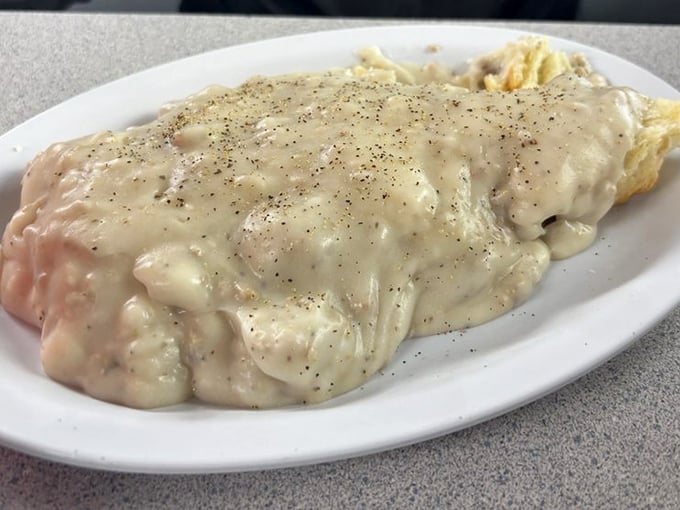 Biscuits and gravy so good they deserve their own zip code. That pepper-flecked white gravy blanket is what breakfast dreams are made of.