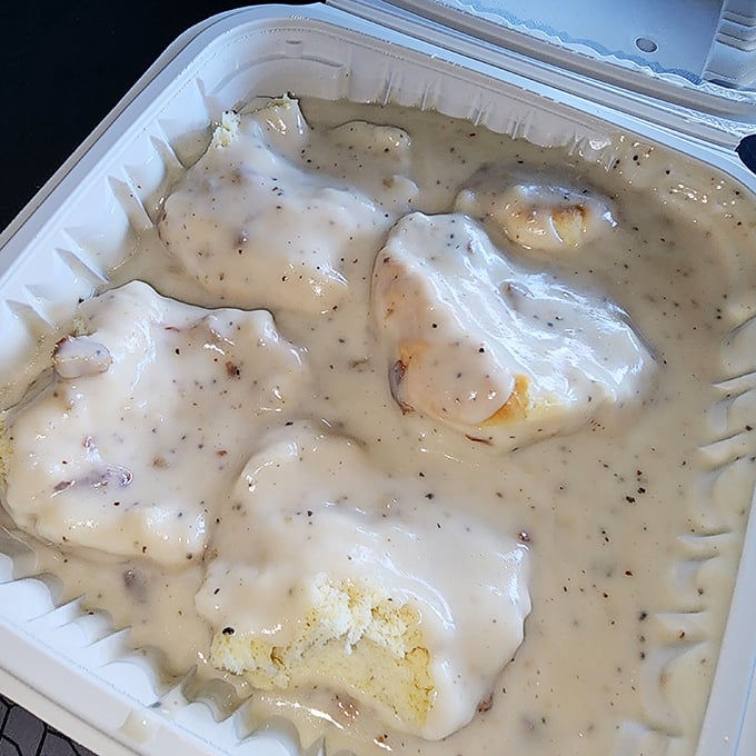 Biscuits and gravy that would make your Southern grandmother nod in approval—creamy, peppery, and worth every delicious calorie.