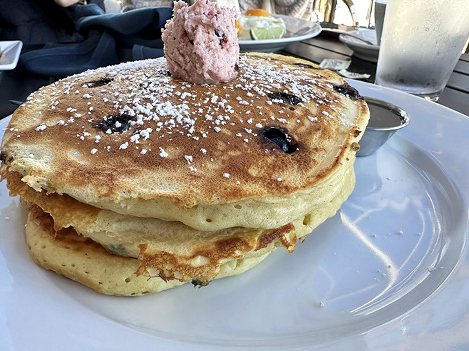 Pancake perfection isn't just about fluff – these cloud-like beauties with berry pockets and powdered sugar dust might actually change your life.