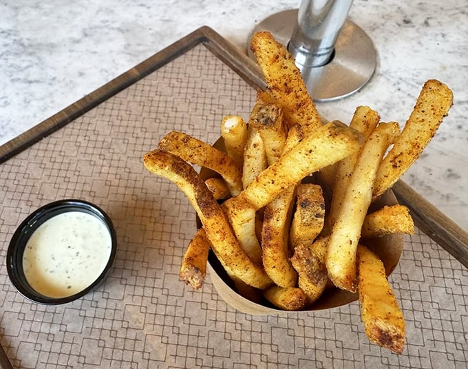 Brassica's fries aren't just a side dish—they're the main event's worthy co-star. Crispy, seasoned perfection that will ruin regular fries for you forever.